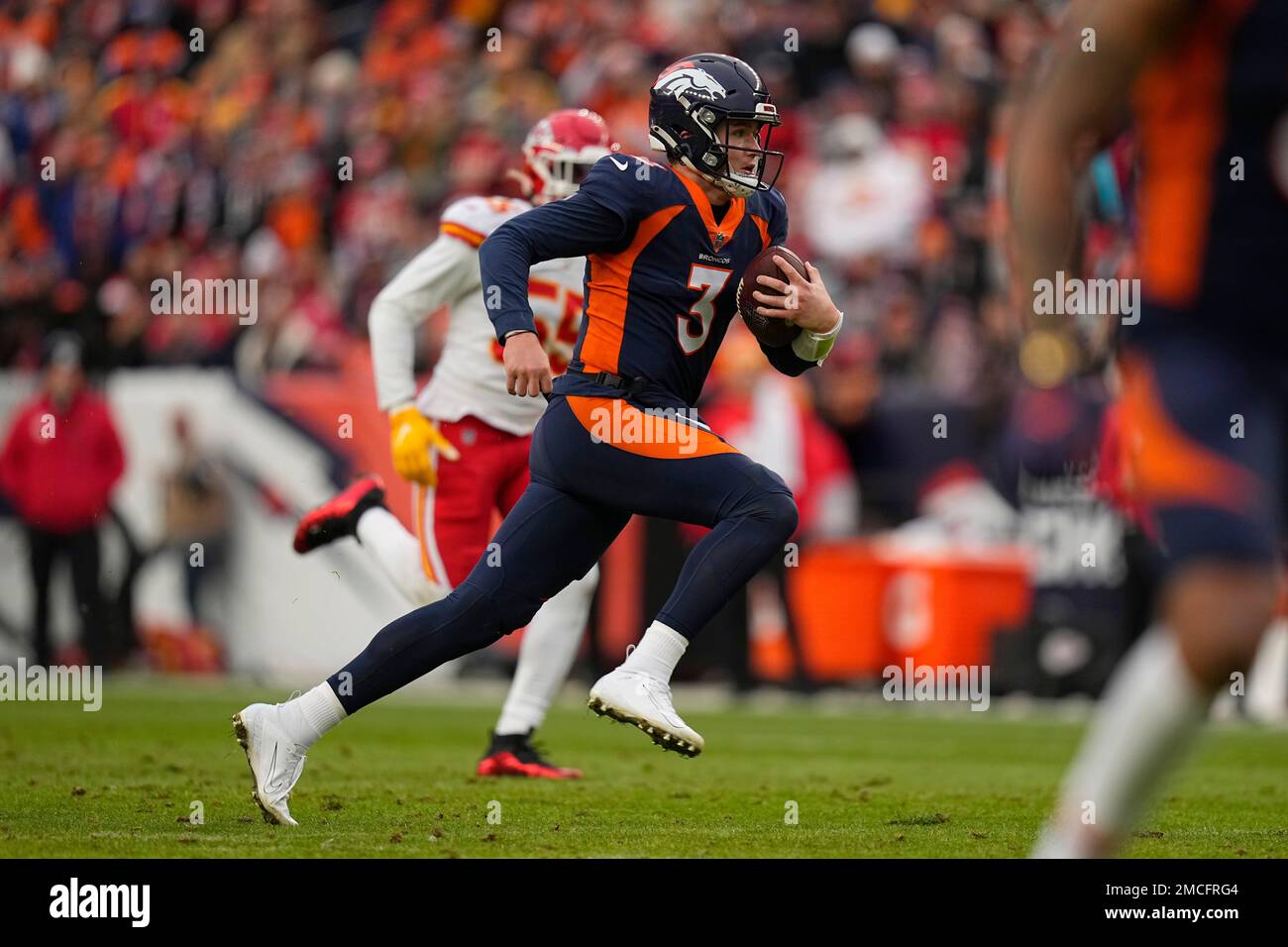 Denver Broncos quarterback Drew Lock (3) runs against the Kansas City Chiefs during the first ...