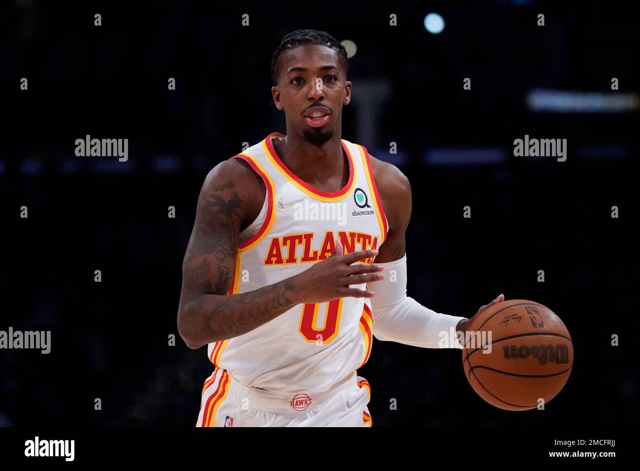 Atlanta Hawks guard Delon Wright (0) controls the ball during an NBA ...