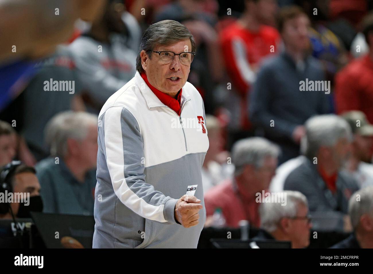 Texas Tech coach Mark Adams yells out to his team during the first half ...