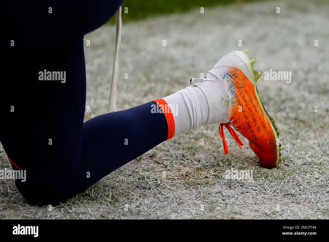 The cleats of Denver Broncos outside linebacker Malik Reed are shown ...