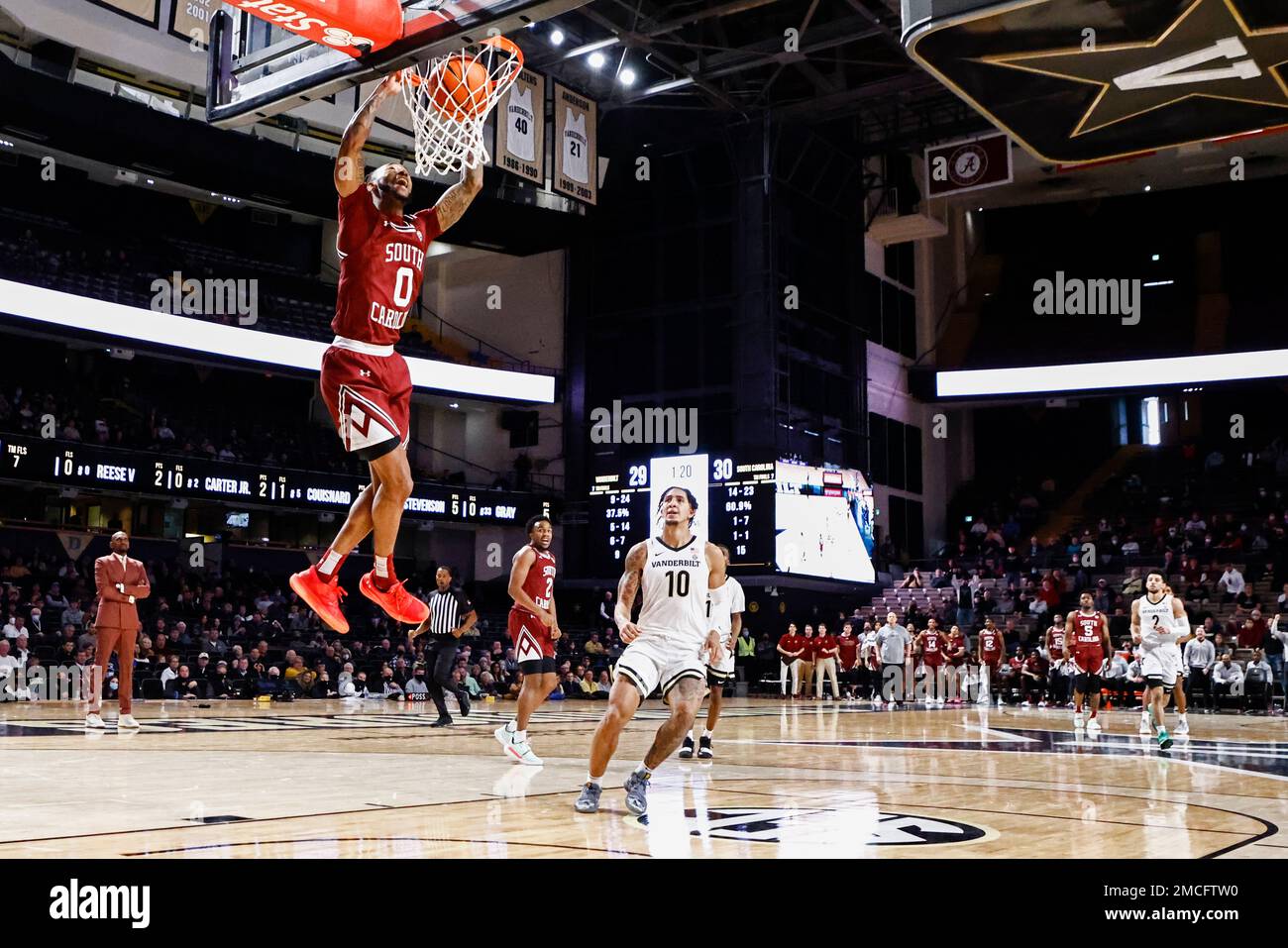 South Carolina guard James Reese V (0) dunks past Vanderbilt forward ...