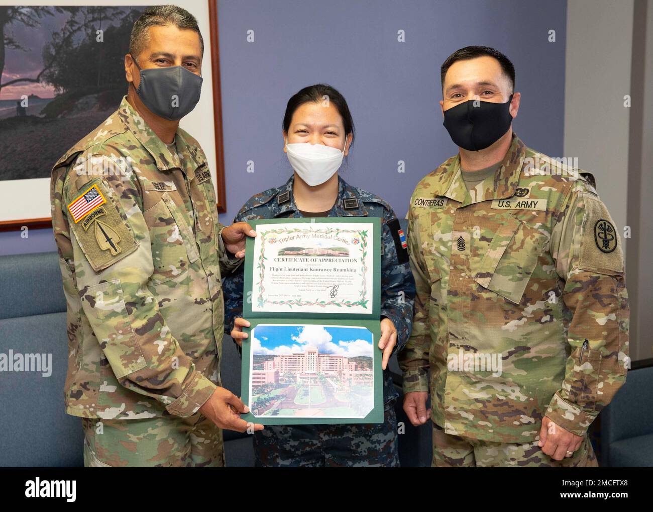 During a small ceremony June 30, TAMC Leaders, Col. Bill Soliz and ...