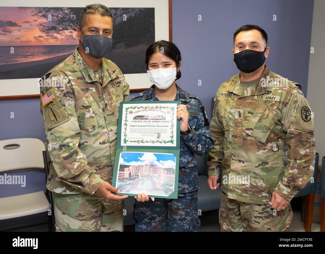During a small ceremony June 30, TAMC Leaders, Col. Bill Soliz and ...