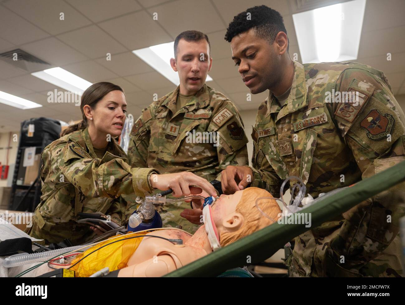 U.S. Air Force medics assigned to the 59th Medical Wing treat a patient ...