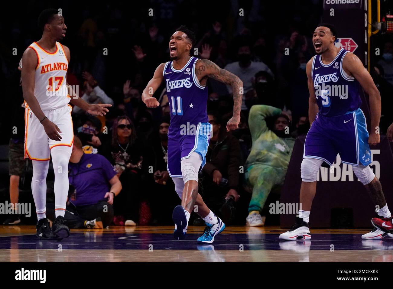 Los Angeles Lakers guard Malik Monk (11) reacts after dunking during ...
