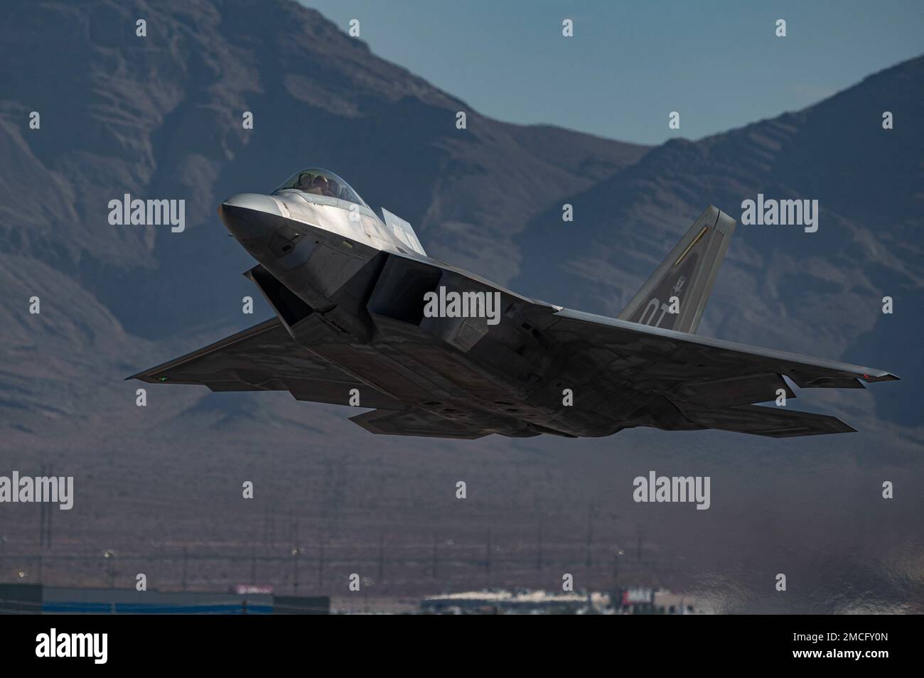 An F-22 Raptor assigned to the 433rd Weapons Squadron takes off from ...