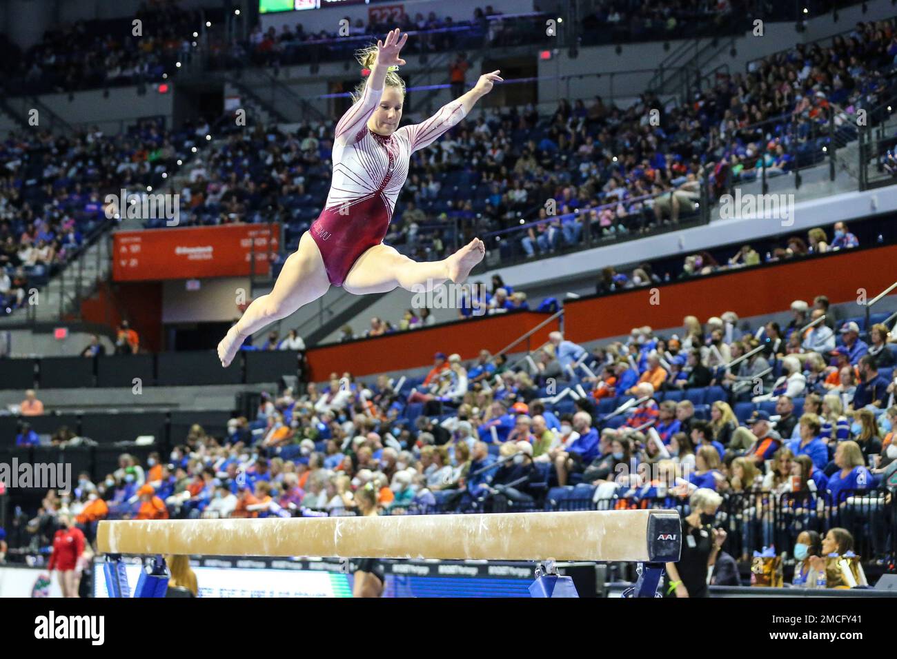 TWU's Daisy Woodring competes on the balance beam during an NCAA ...