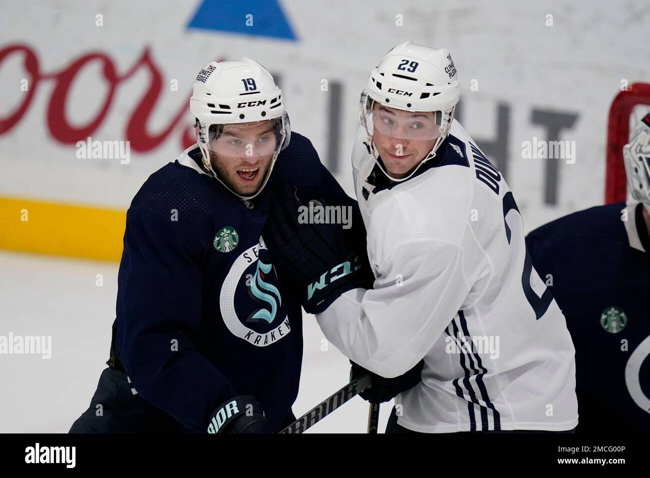 Seattle Kraken center Calle Jarnkrok, left, and defenseman Vince Dunn ...