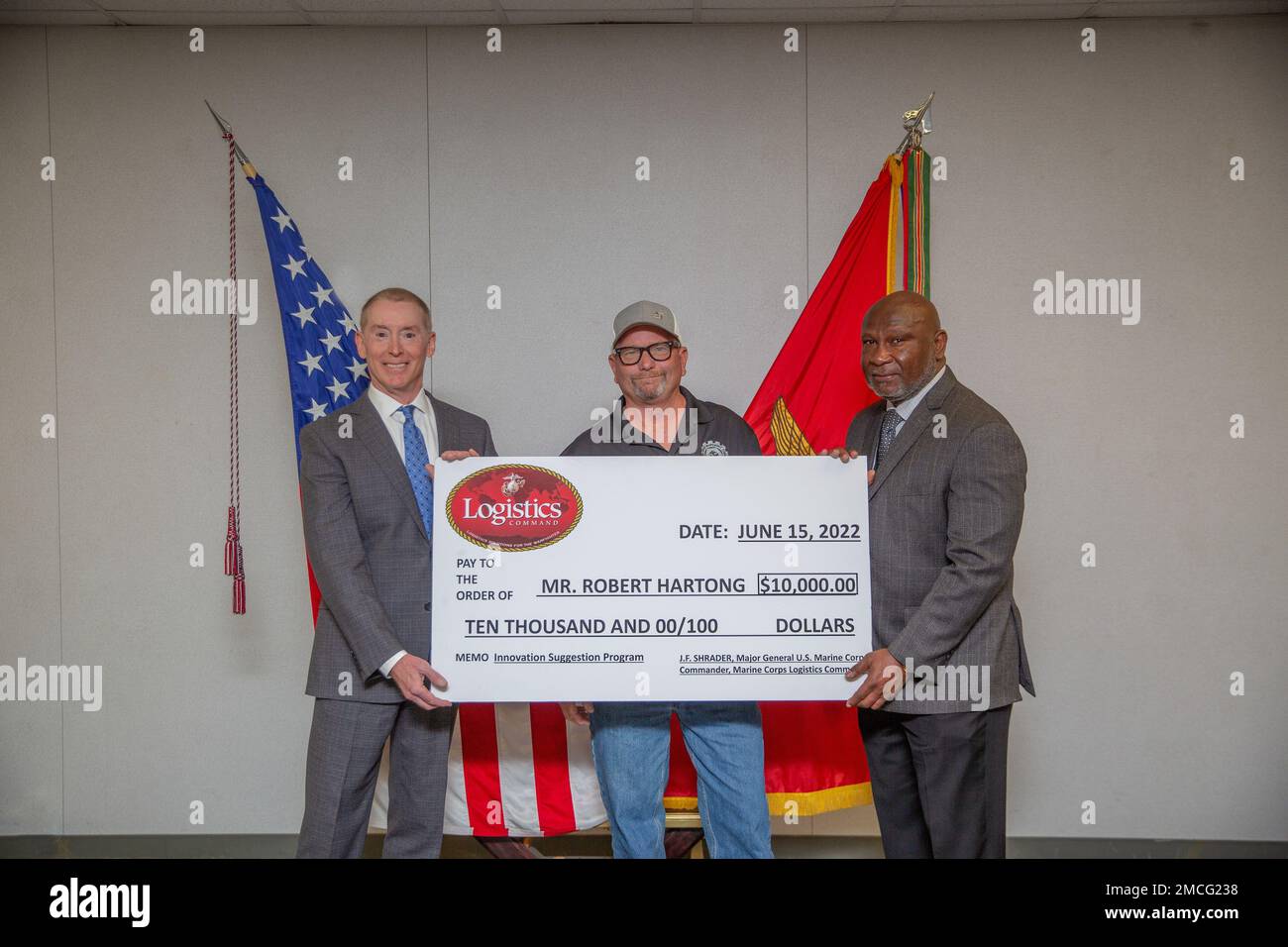 Robert "Chip" Schwartz (left), Production Plant Barstow manager, holds ...