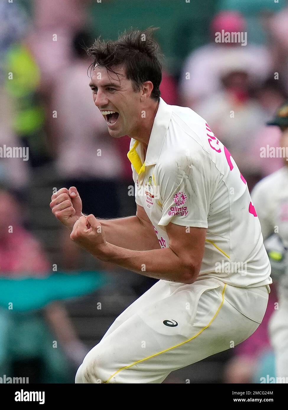 Australia's Pat Cummins celebrates taking the wicket of England's Jos ...