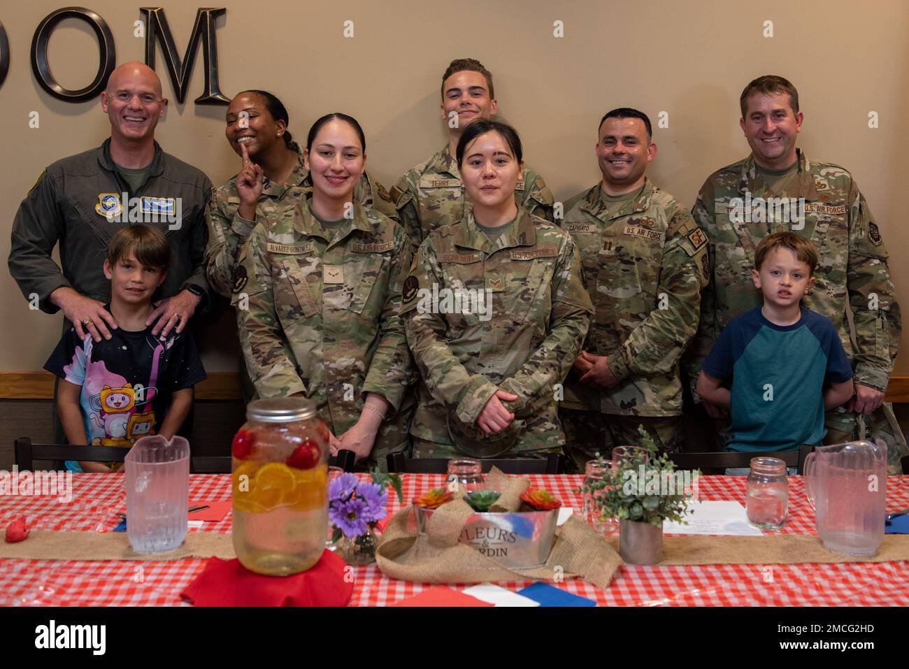 The judges and winners of the cooking competition pose for a group photo at Fairchild Air Force ...