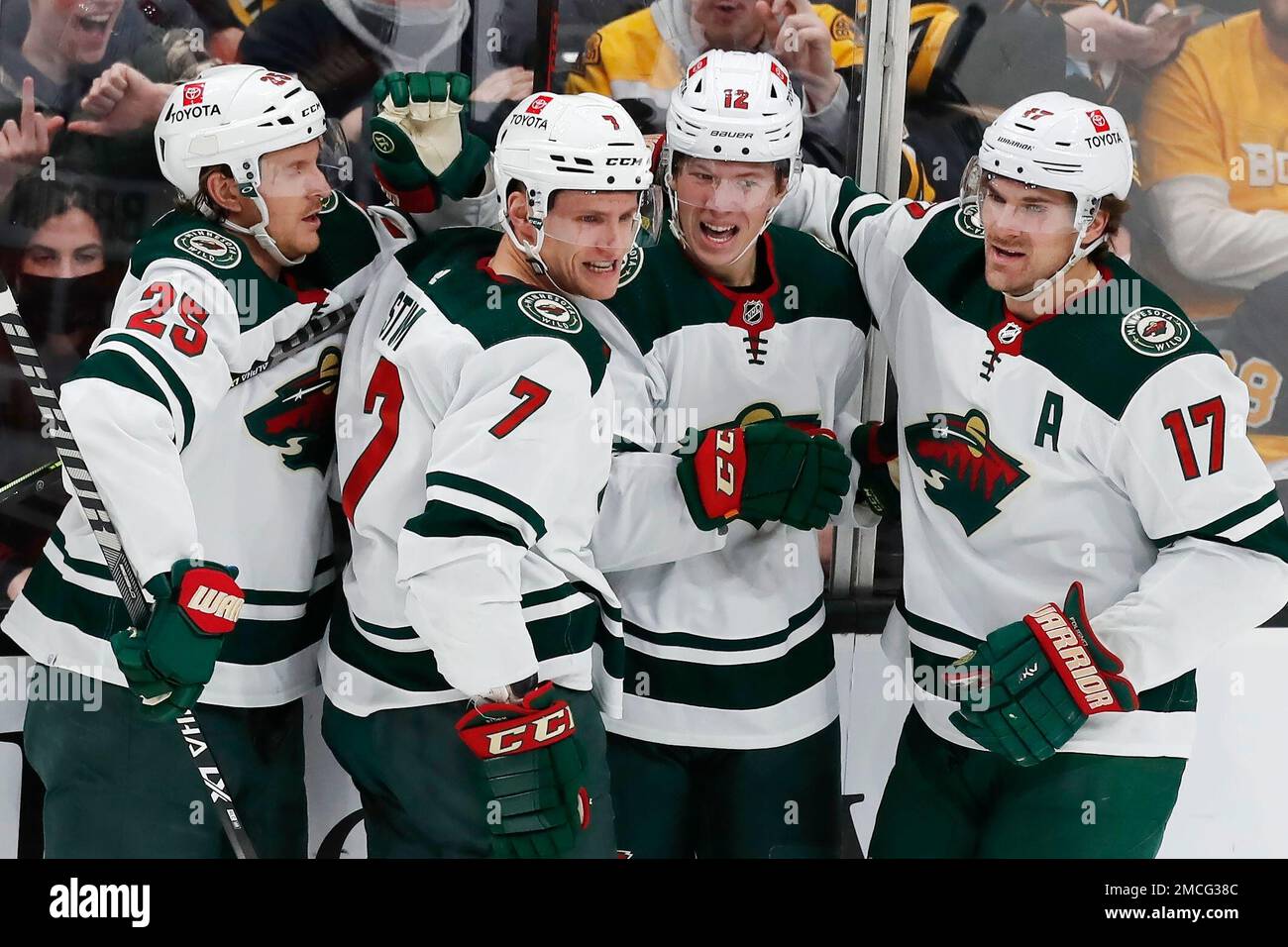 Minnesota Wild's Matt Boldy (12) celebrates his goal with Jonas Brodin ...