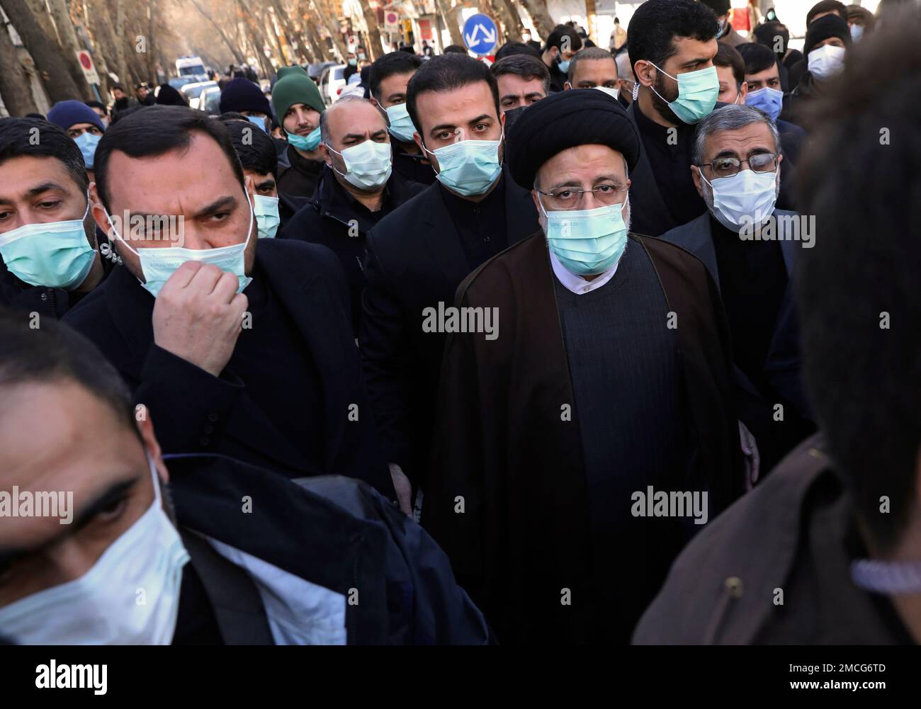 President Ebrahim Raisi, center right, attends a funeral procession for ...