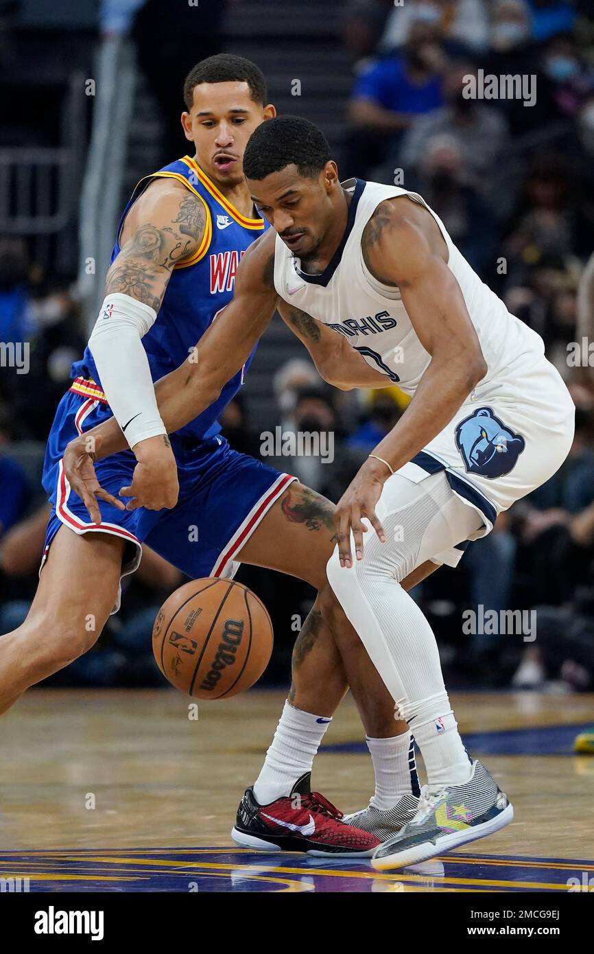 Golden State Warriors forward Juan Toscano-Anderson, left, defends ...