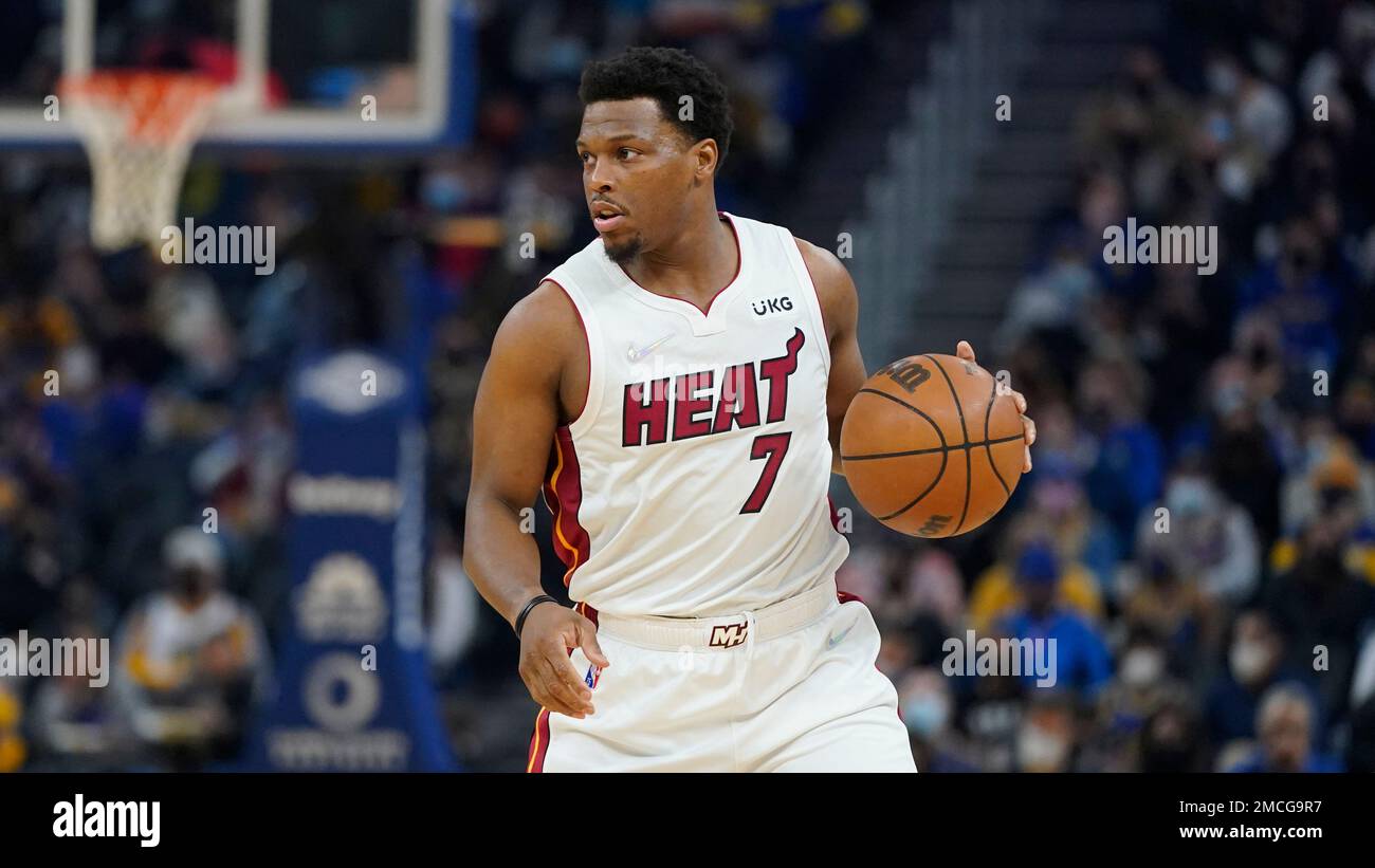 Miami Heat guard Kyle Lowry (7) dribbles the against the Golden State ...