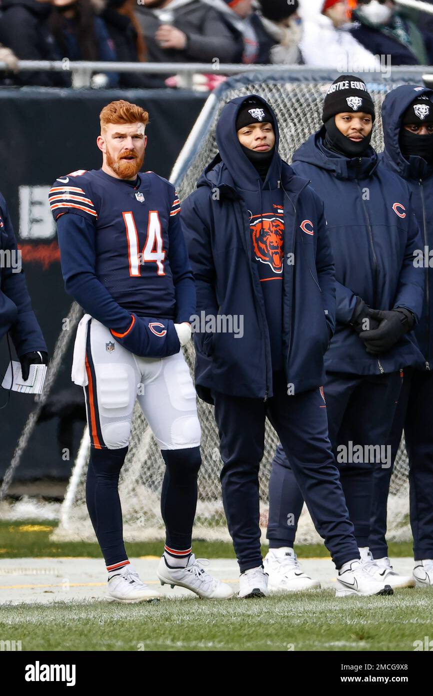 Chicago Bears quarterbacks Andy Dalton (14) and Justin Fields (1) stand ...