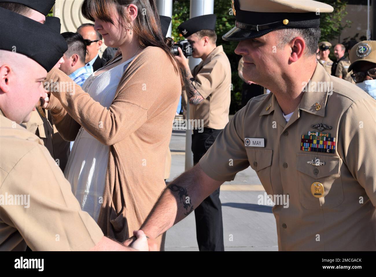 Congratulations bestowed...Luke P. Howell receives a hearty handshake ...