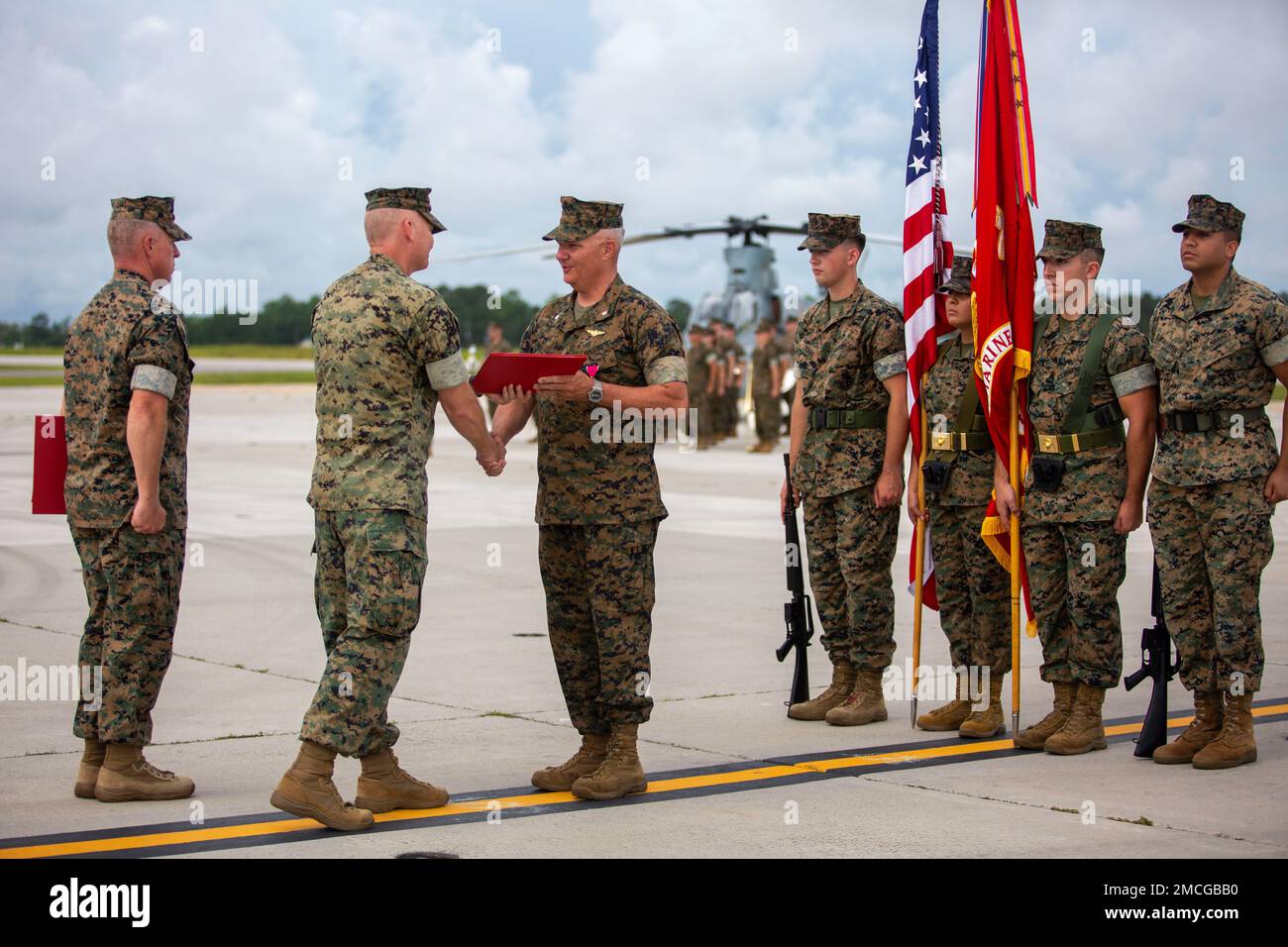 U.S. Marine Corps Col. Curtis V. Ebitz, left, commanding officer ...