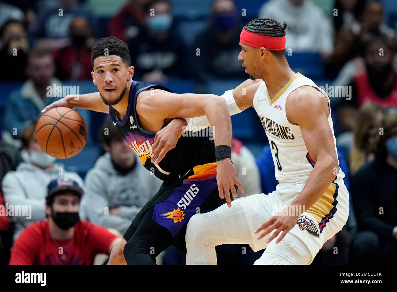 Phoenix Suns guard Devin Booker (1) moves to the basket against New ...