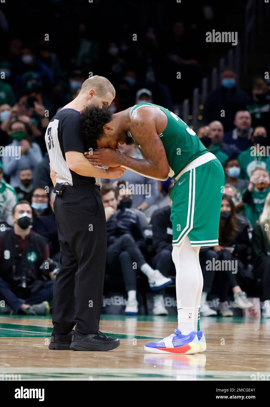 Boston Celtics guard Marcus Smart (36) pleads with referee Tyler Ford ...