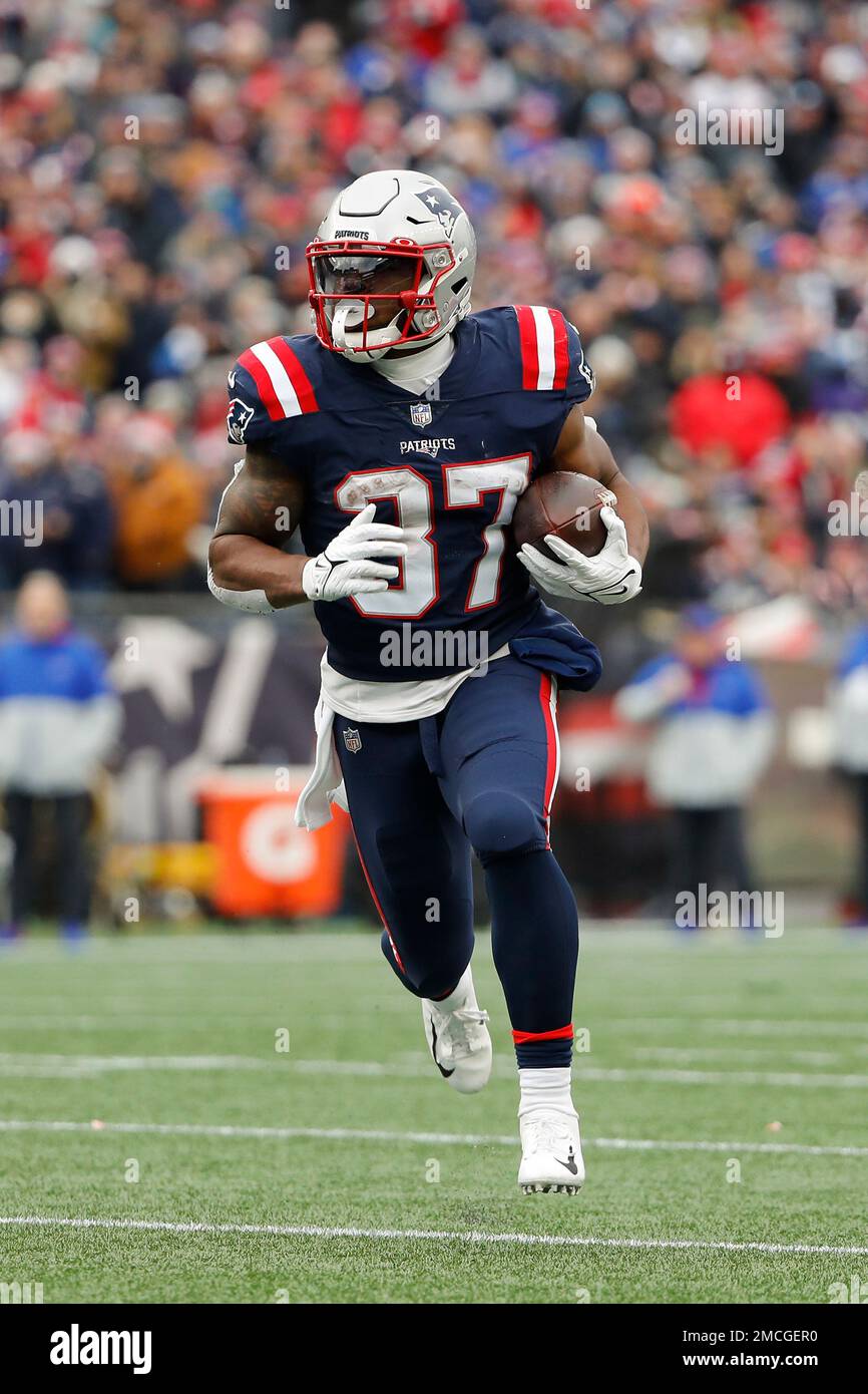 New England Patriots' Damien Harris runs against the Buffalo Bills ...