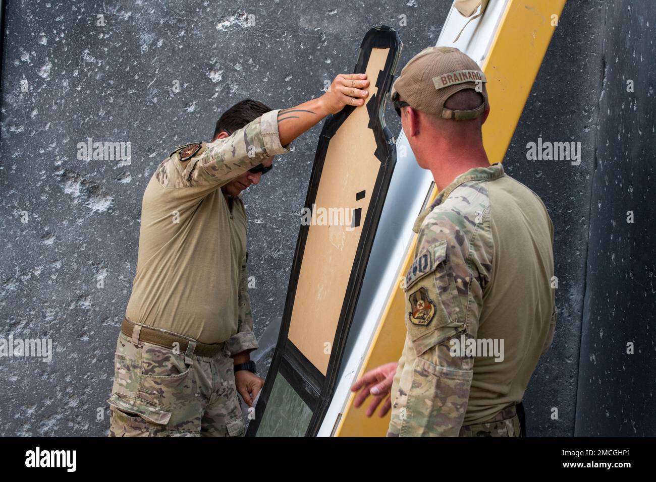 U.S. Air Force Staff Sgt. Josiah Brainard and Staff Sgt. George Cochran ...