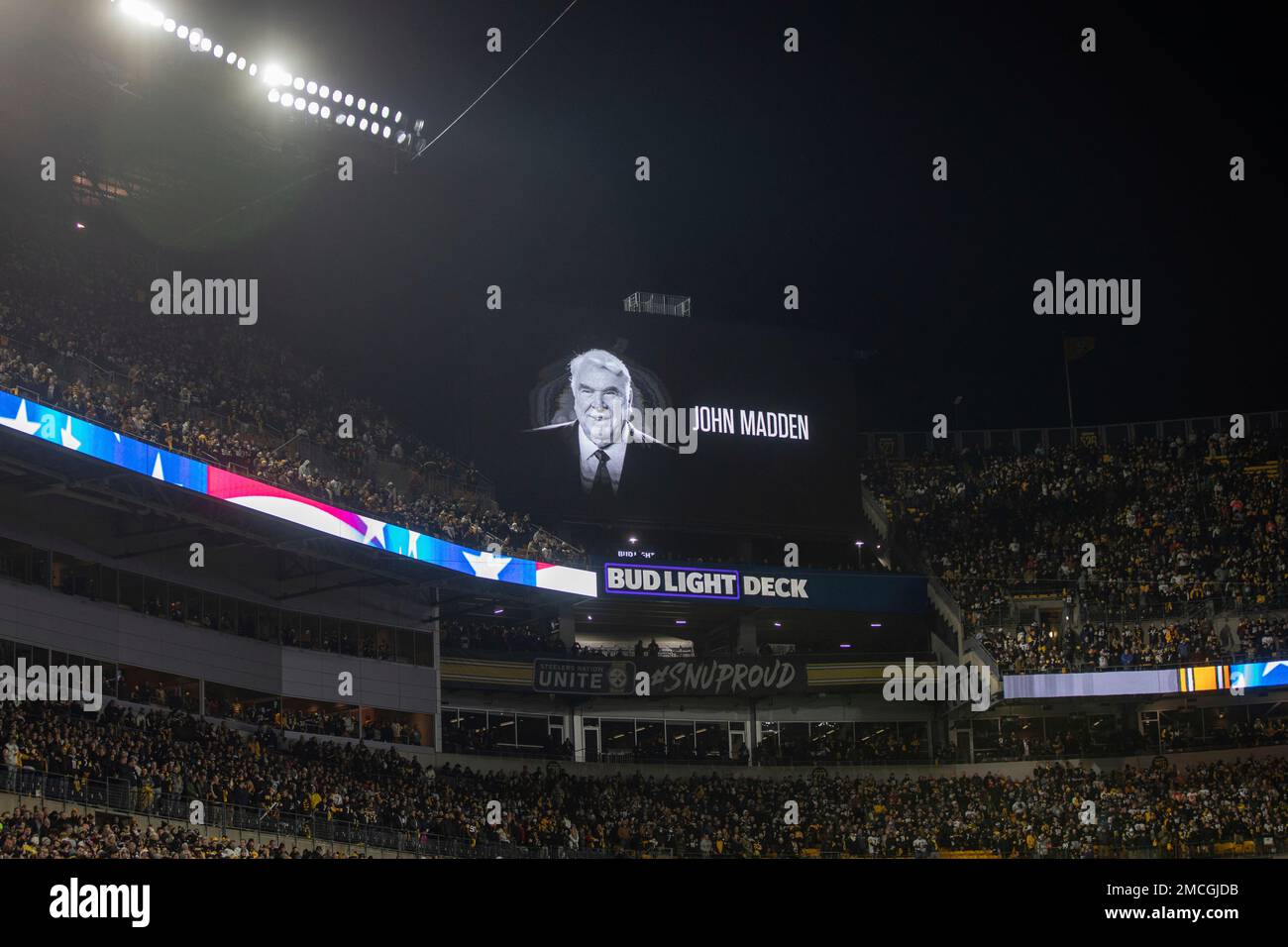 A scoreboard is shown during a moment of silence in remembrance of John ...