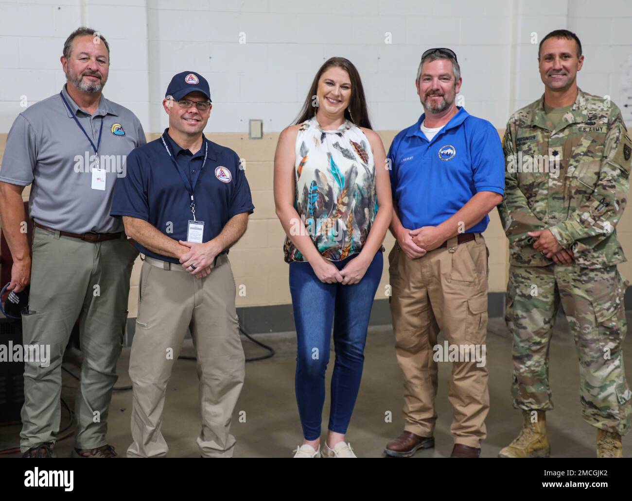 John Lyons, cabinet deputy secretary, Jeremy Slinker, director for ...
