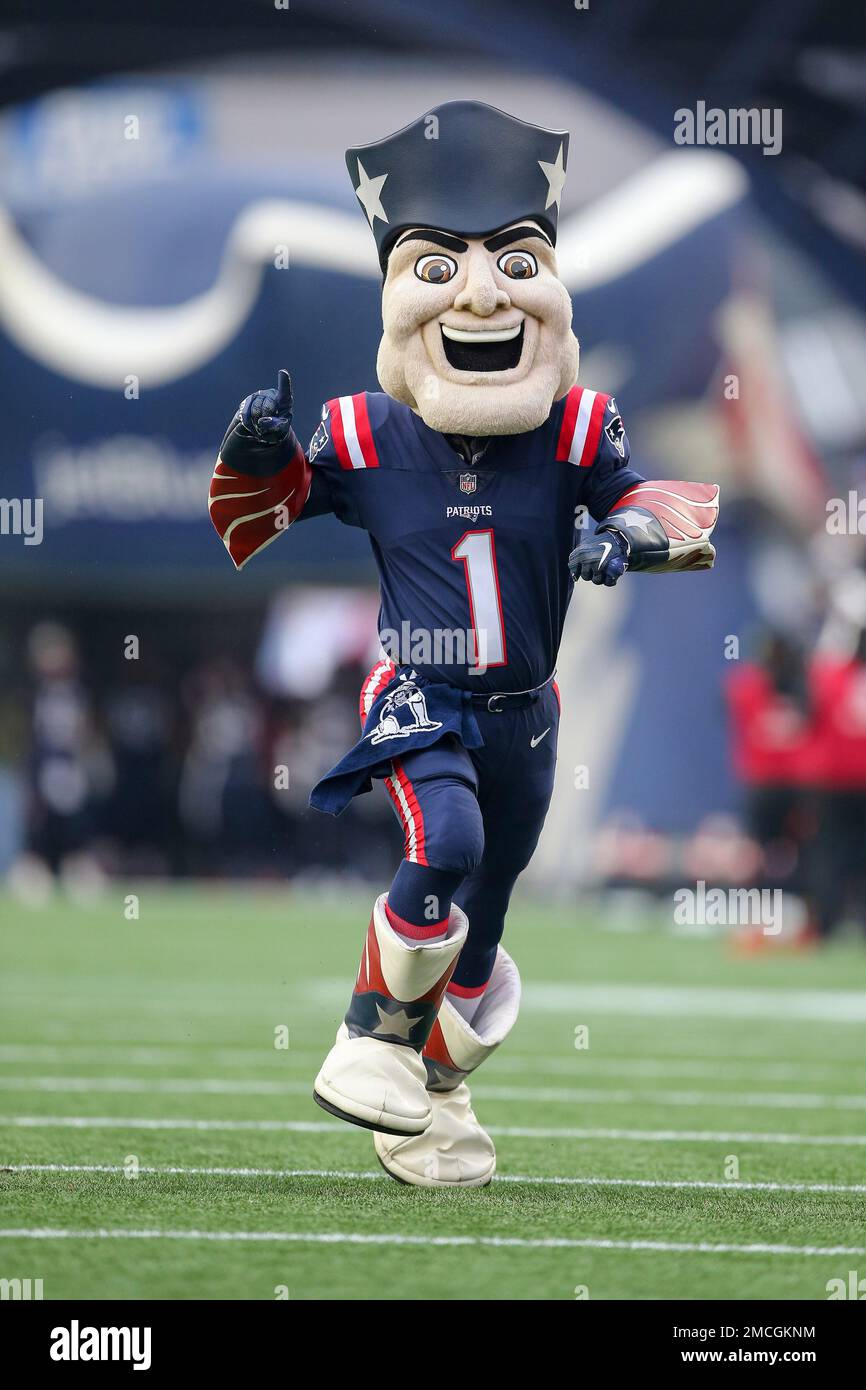New England Patriots mascot Pat Patriot runs onto the field prior to an ...