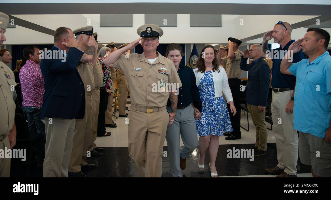 NEWPORT, R.I. (July 1, 2022) Master Chief Musician Gresh Laing is rung ...