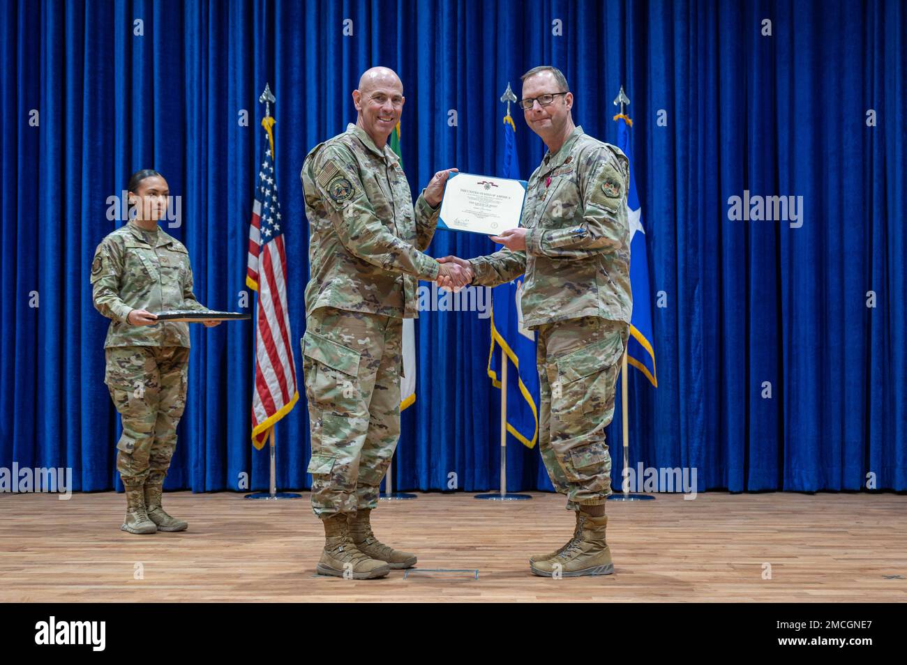 U.S. Air Force Col. Clinton M. Wilson, right, outgoing commander, 386th ...