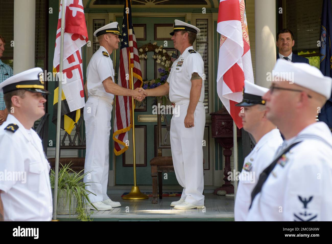 U.S. Navy Capt. Cassidy Norman, left, commanding officer of the ...
