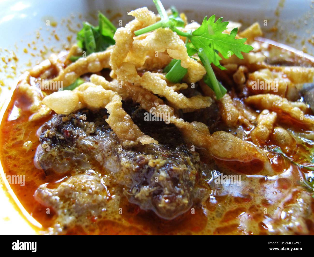 Local traditional thai food khao soi gai or cuisine northern thai curry ...
