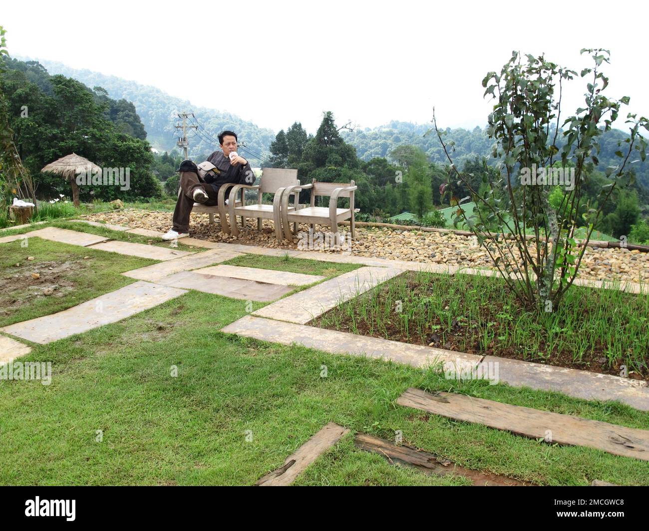 Travelers and photographer thai men travel visit and sitting rest ...