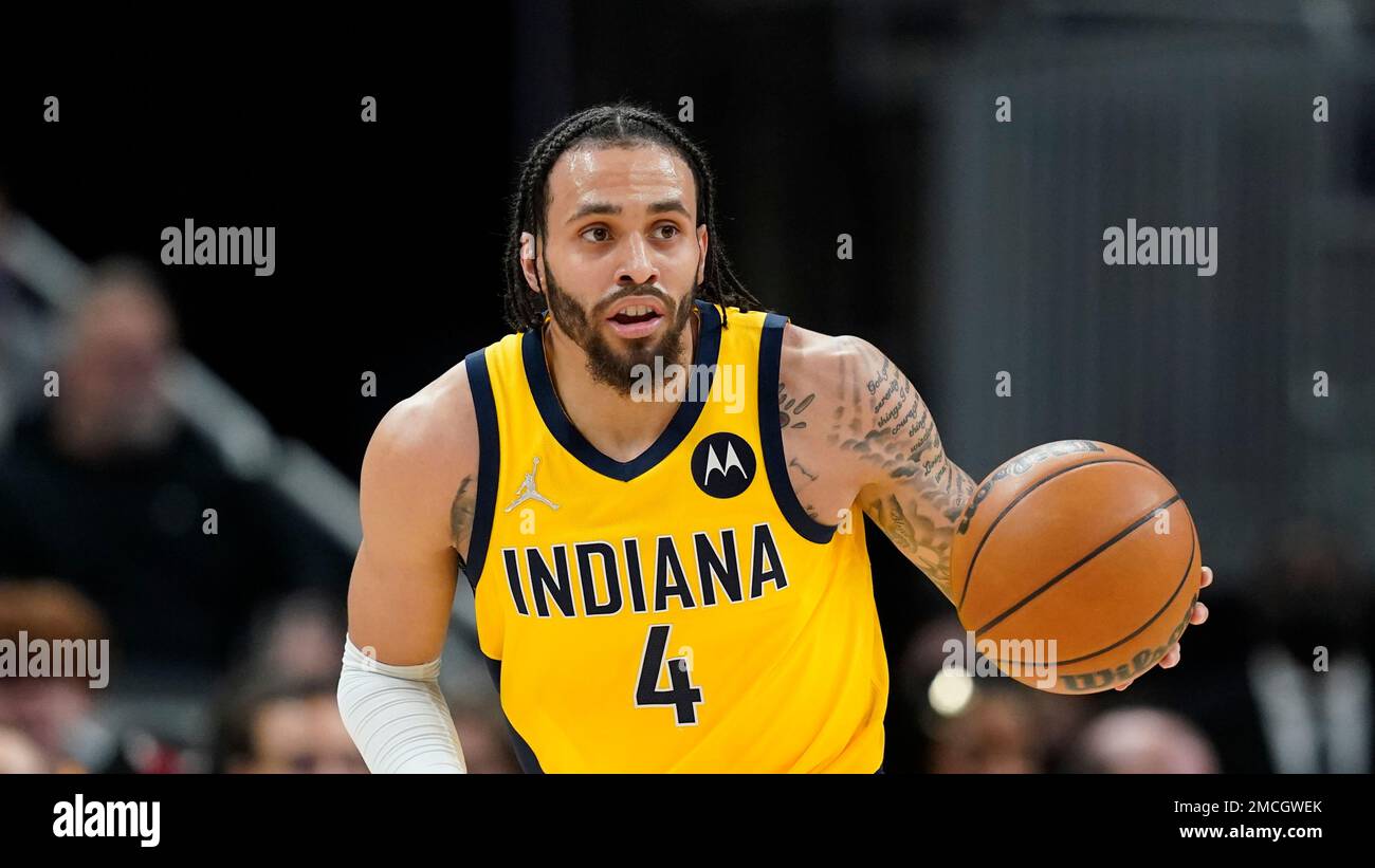 Indiana Pacers' Duane Washington Jr. dribbles during the first half of ...