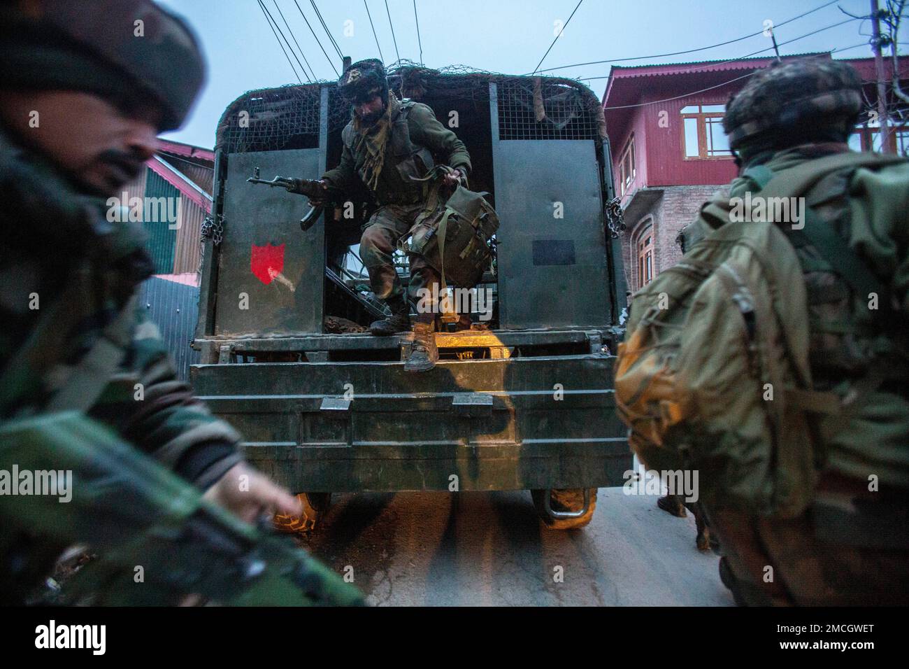 Indian army soldiers arrive during a counterinsurgency operation on the ...