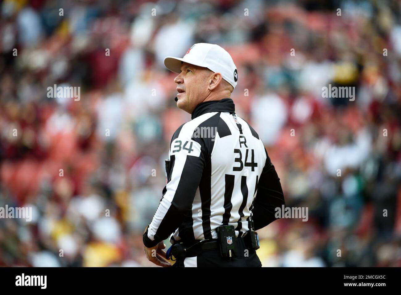 NFL referee Clete Blakeman stands in the end zone prior to the start of ...