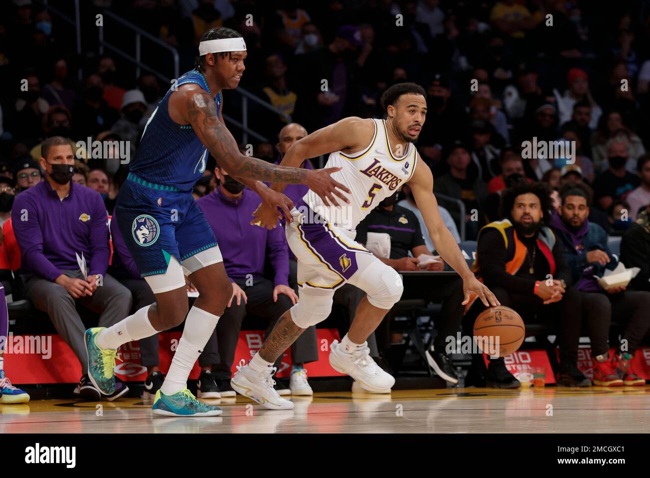 Los Angeles Lakers guard Talen Horton-Tucker (5) drives pass Minnesota ...