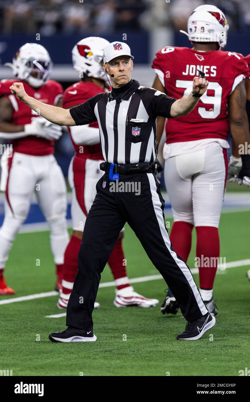 Referee Scott Novak signals during an NFL football game between the ...