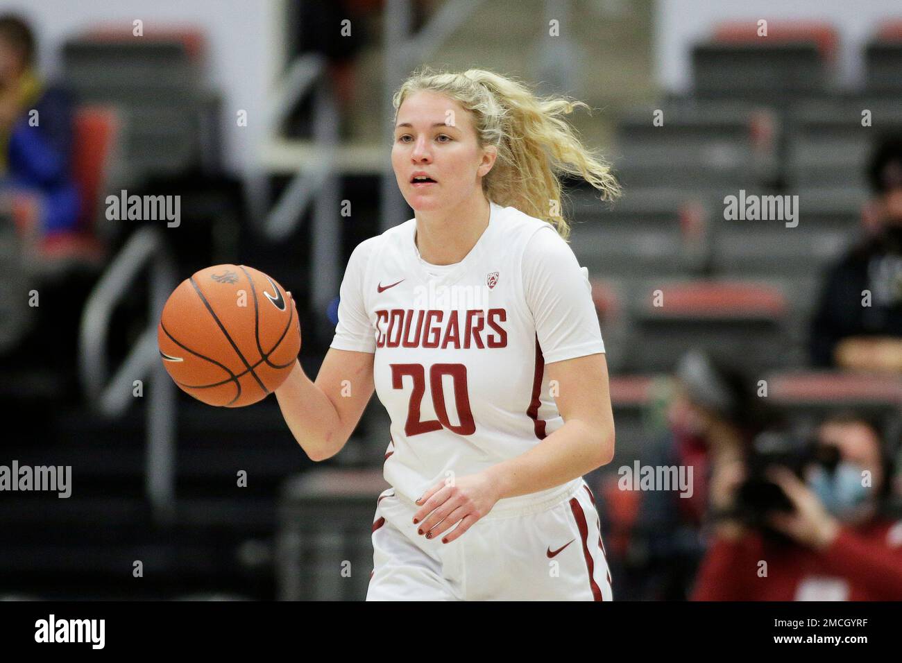 Washington State guard Grace Sarver controls the ball during the first ...