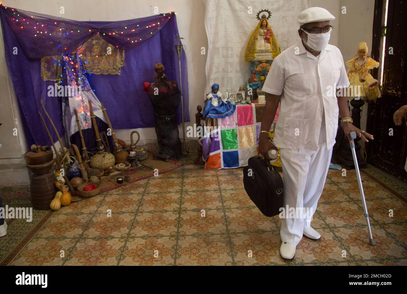 Santeria Priest Lazaro Cuesta stands after the reading of the "Letter ...