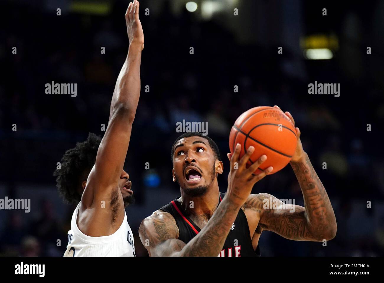 Louisville forward Malik Williams (5) works against Georgia Tech ...