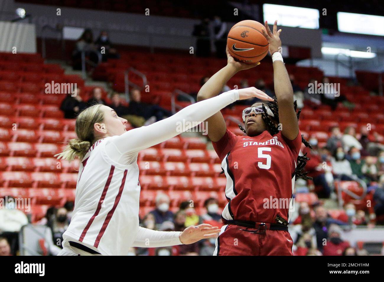 Stanford forward Francesca Belibi, right, shoots over Washington State ...