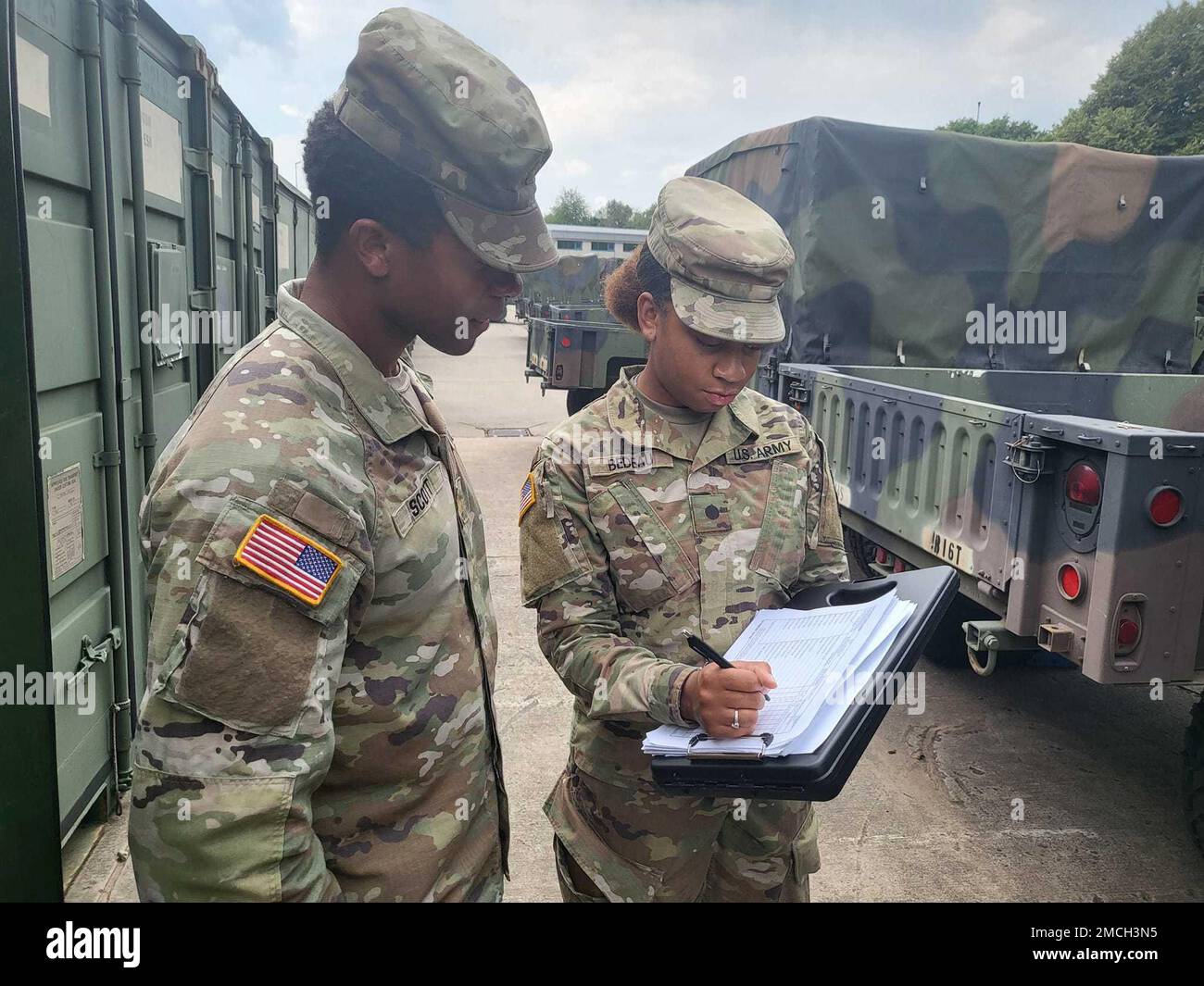 Cadet Angel Bedeau, (right) from Georgia Military College reviews a ...