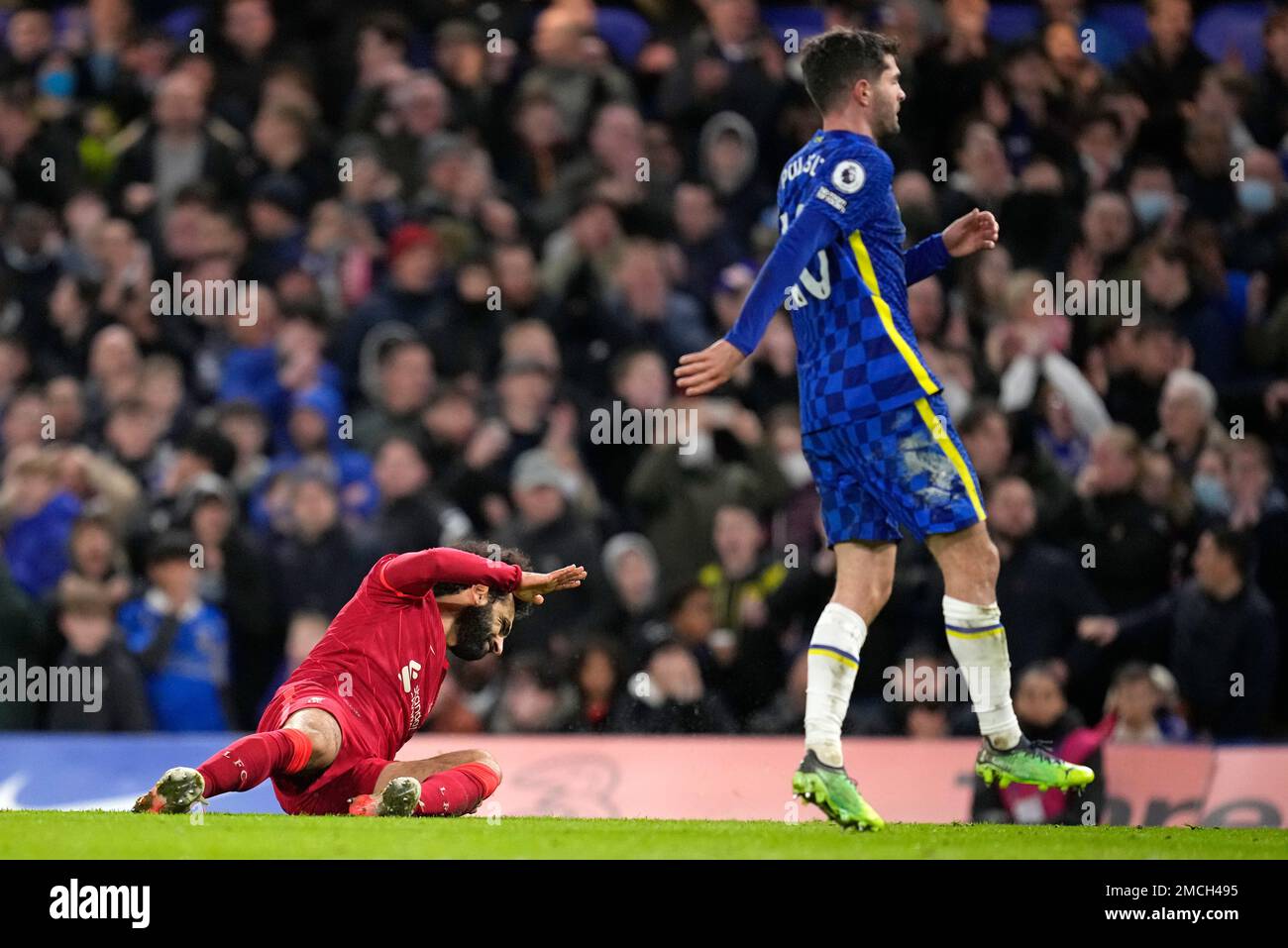 Liverpool's Mohamed Salah, left, reacts after missing a chance during ...