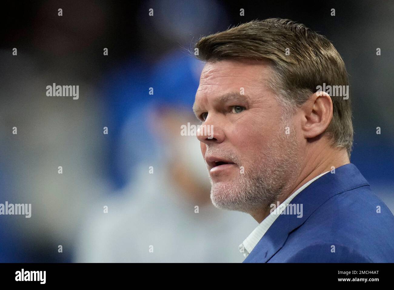 Indianapolis Colts general manager Chris Ballard stands on the field ...