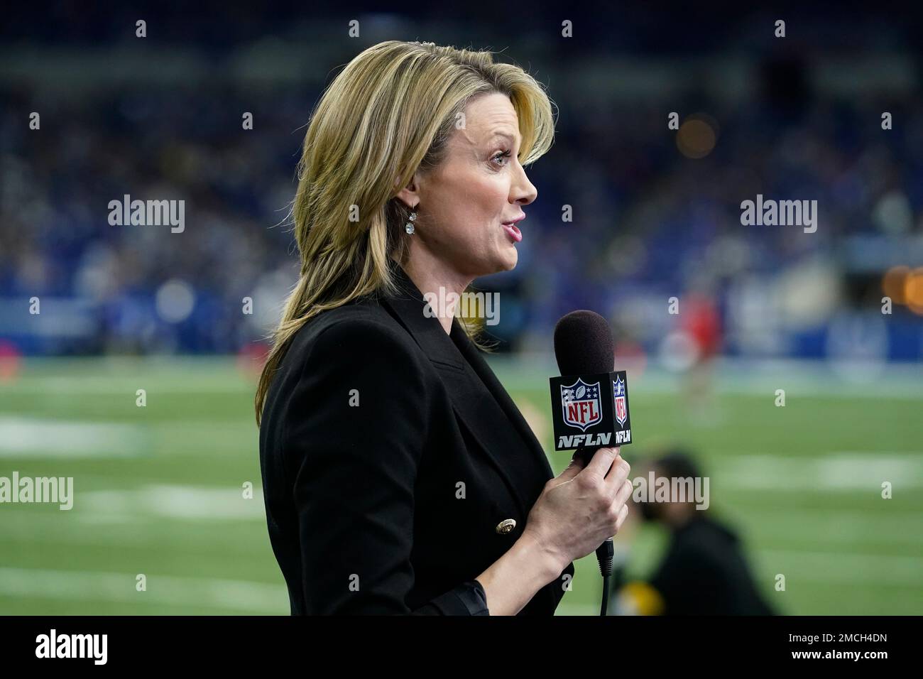 NFL Network reporter Stacy Dales works on the sideline before an NFL ...