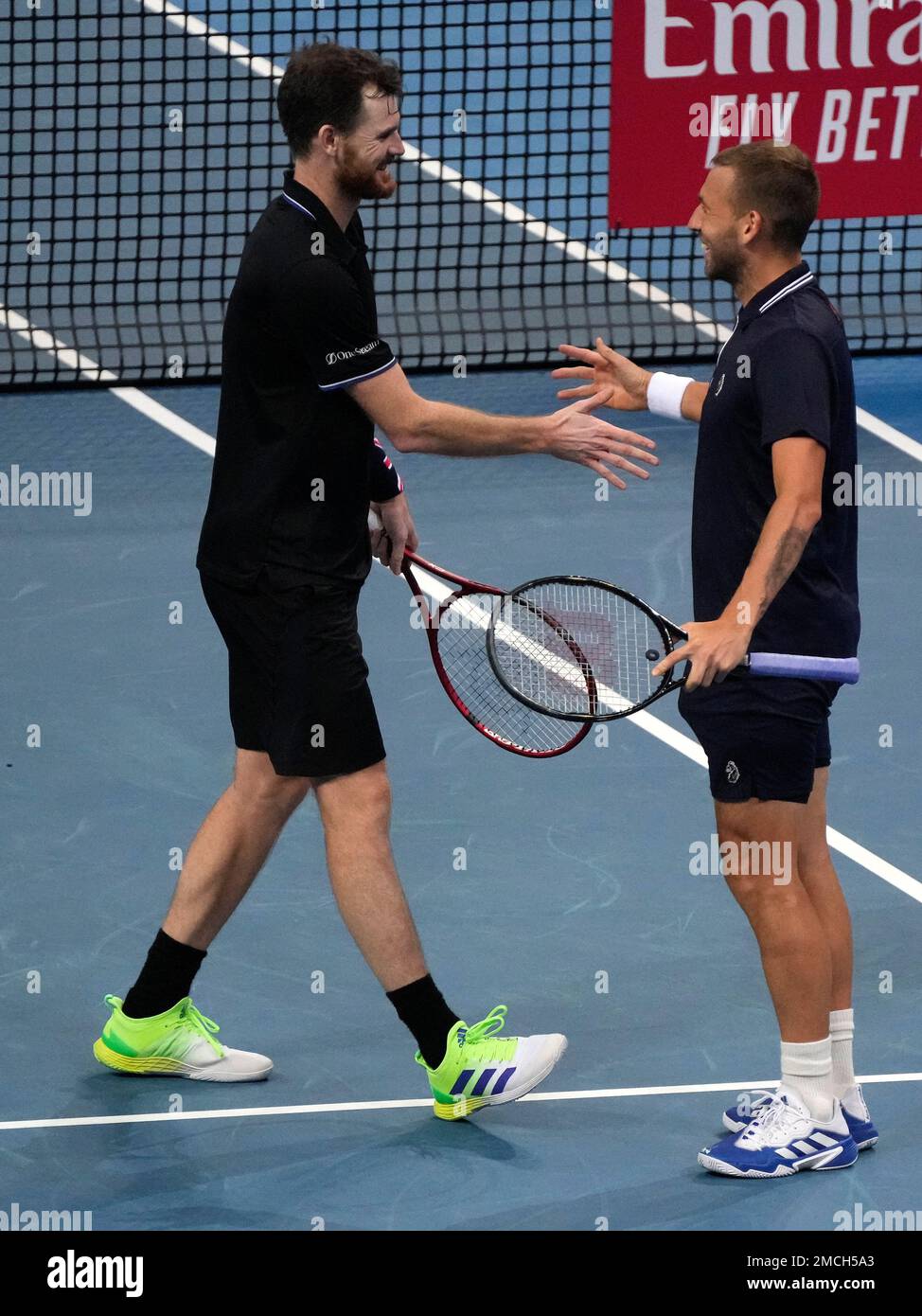 Britain's Daniel Evans, right, and Jamie Murray celebrate their win ...