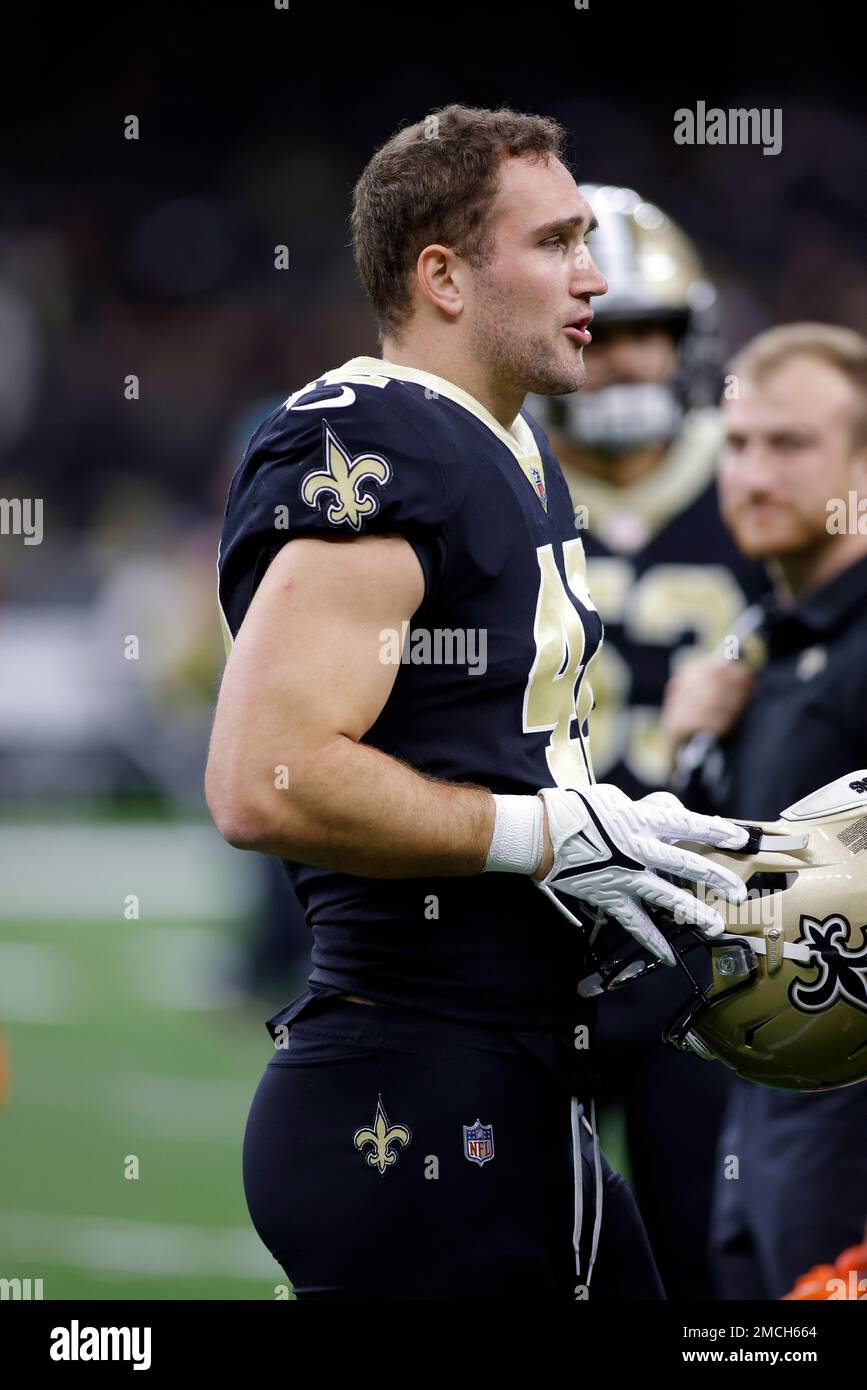 New Orleans Saints linebacker Chase Hansen (42) warms up before an NFL ...