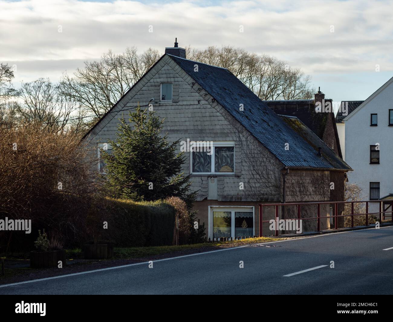 Asbestos cement on the residential building. Hazardous material as a ...